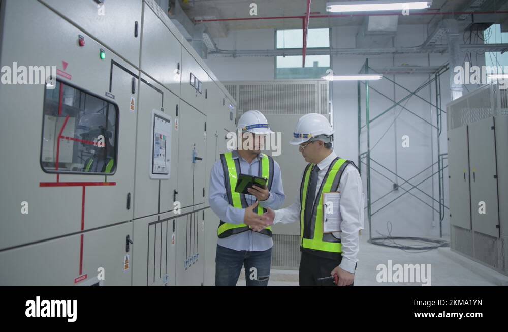 Engineer concept of 4k Resolution. The employee is checking the ...