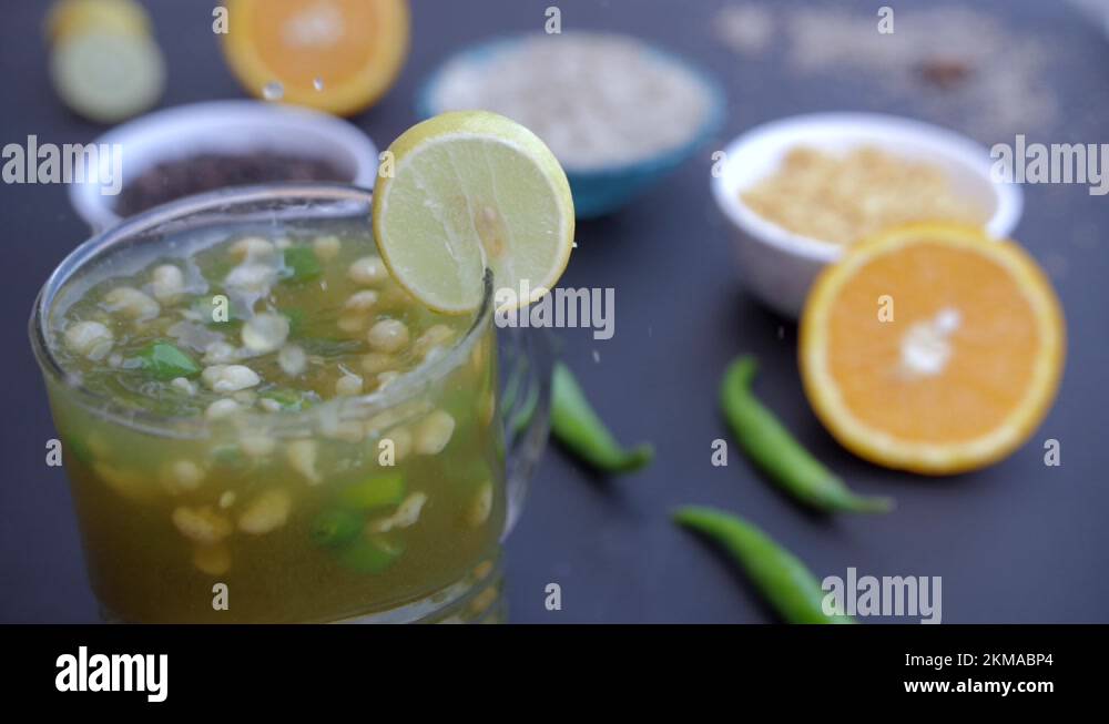 Lemon slices splashing in a fresh JalJira glass with Boondi and green ...