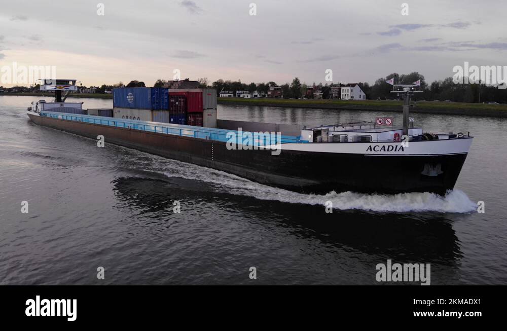 Acadia Inland Vessel Loaded With Cargo Containers Cruising In The River ...