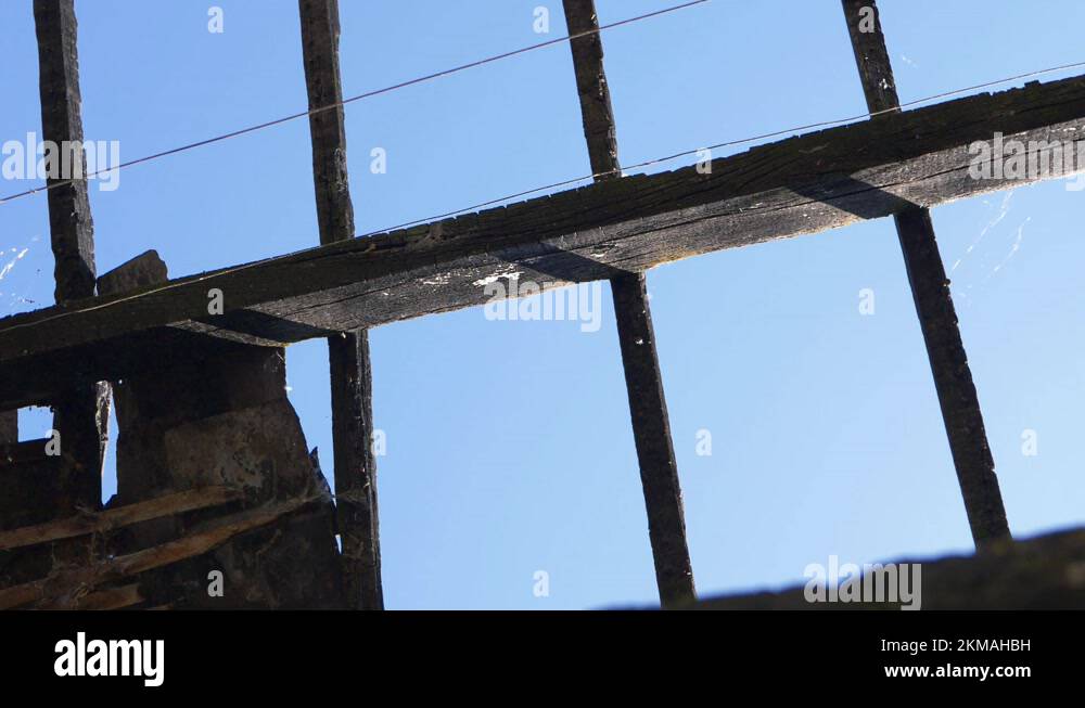 Roof rafters of derelict building after fire Stock Video Footage - Alamy