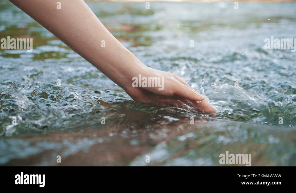 Hand touching water Stock Videos & Footage - HD and 4K Video Clips - Alamy