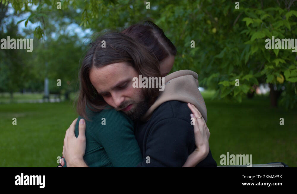 Man and woman hug and forgiving each other after dispute conversation ...
