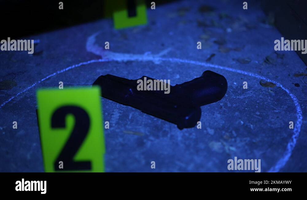 Gun At Crime Scene, Murder Weapon With Evidence Markers, CSI Stock ...