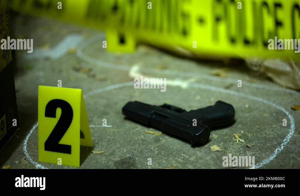 Gun At Crime Scene, Murder Weapon With Evidence Markers, CSI Stock ...