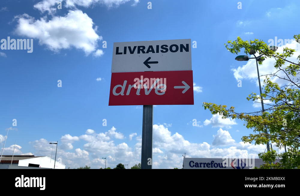 French "Delivery" and "Drive-through" road signs with arrows Stock ...