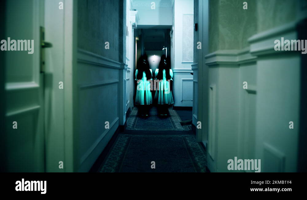 Two creepy twin girls standing in hotel corridor, possessed creatures ...