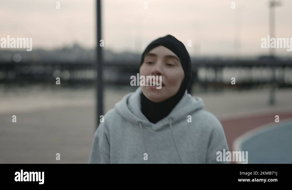 Fitness muslim woman with piercing in nose running outdoors Stock Video ...