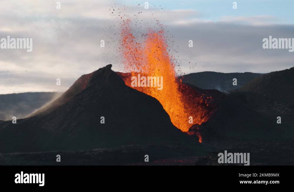 Fountain of magma erupting from volcano crater, Fagradalsfjall in ...