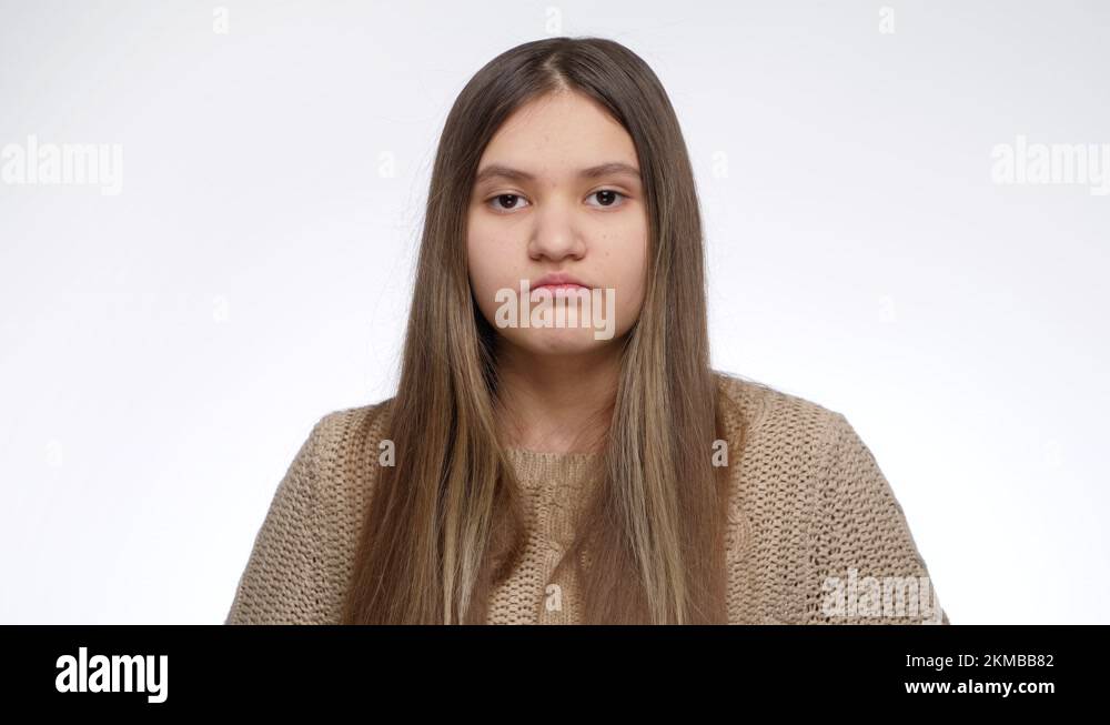 Angry girl controlling her emotions and breathing deeply to calm down ...