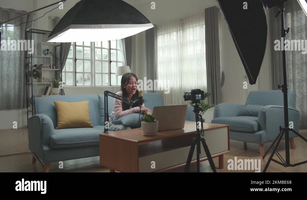 Asian Girl Vlogger Sing A Song. Professional Light Equipment Stock ...