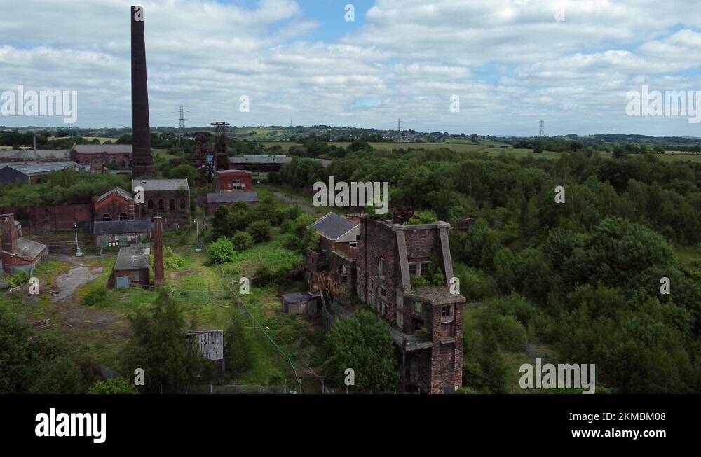 Abandoned old overgrown coal mine industrial museum buildings aerial ...