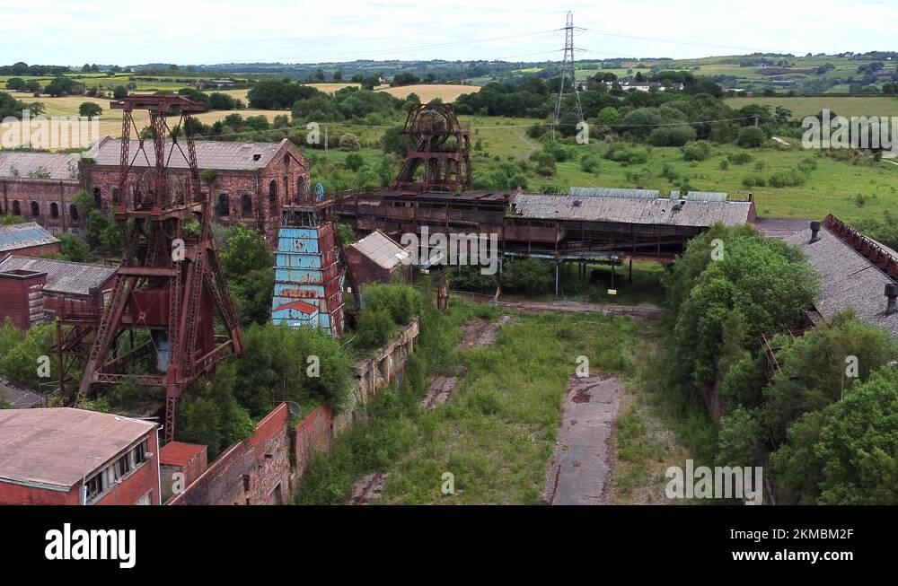 Abandoned old overgrown coal mine industrial museum buildings aerial ...