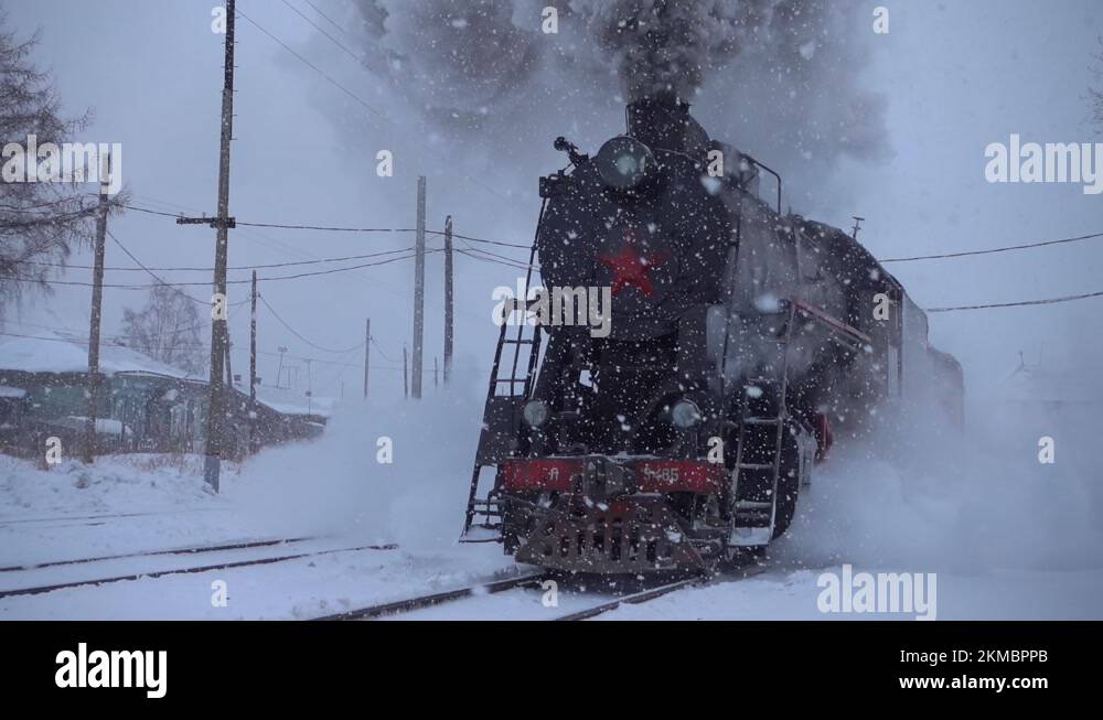 Gimbal winter snow blizzard train steam locomotive rides railway Russia ...