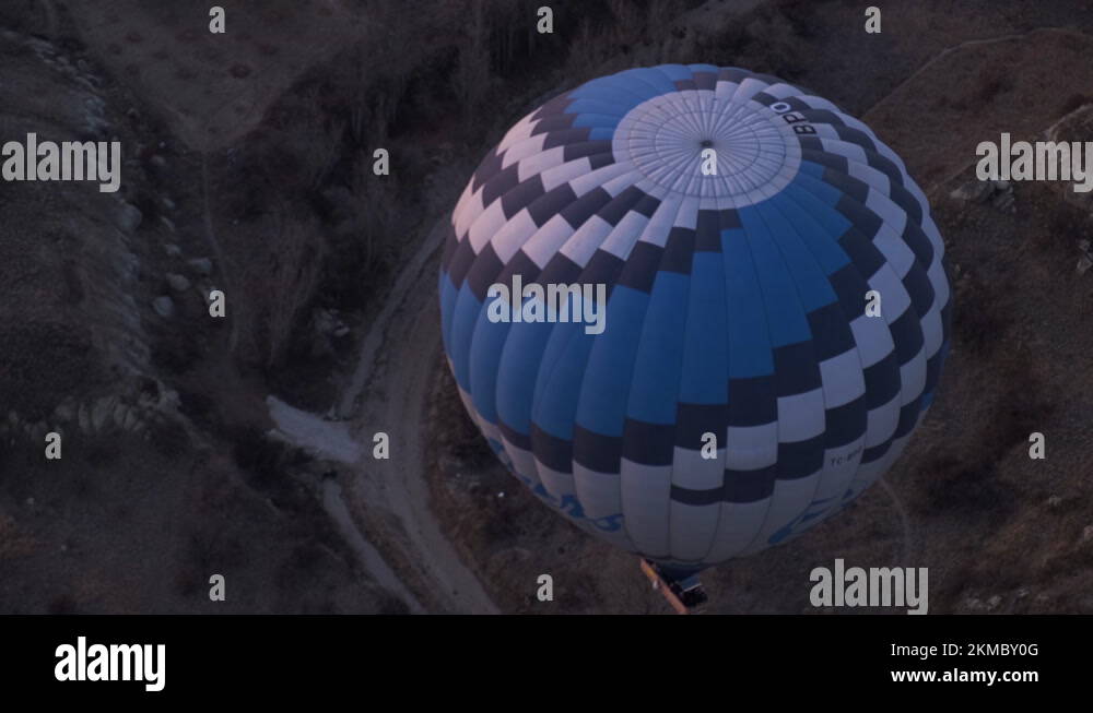 Huge Balloon Floats over Rocky Terrain. Top View. Hot Air Balloon ...