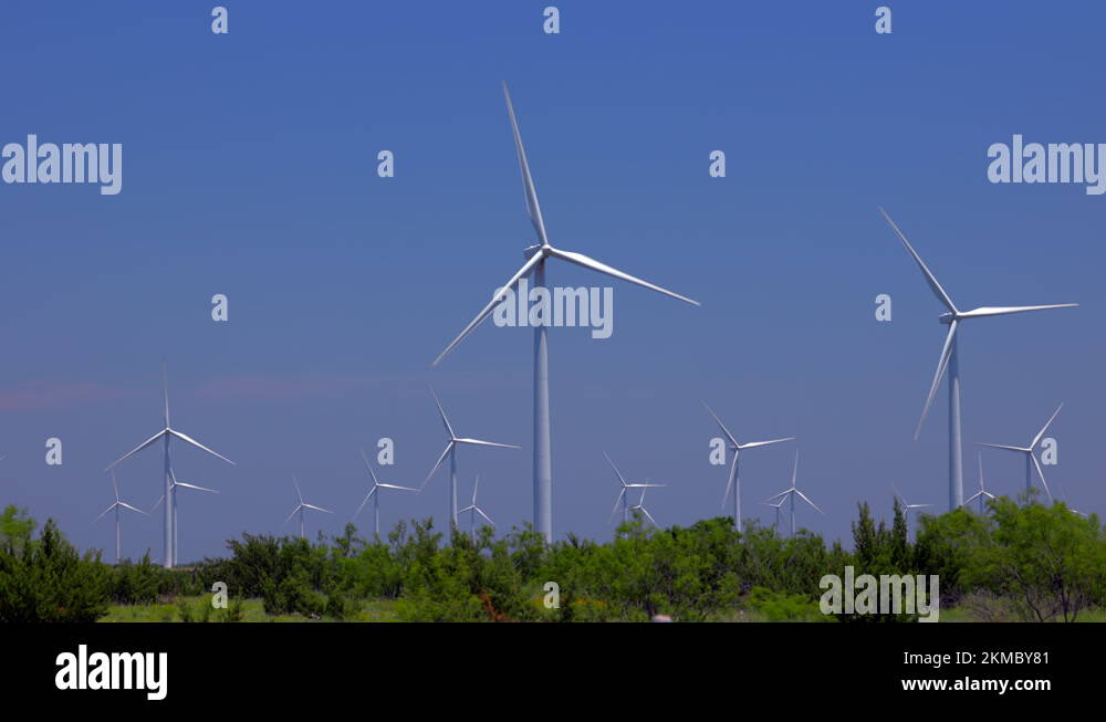 4K Wind Turbines Generating Renewable Energy On A Texas Wind Farm Stock ...