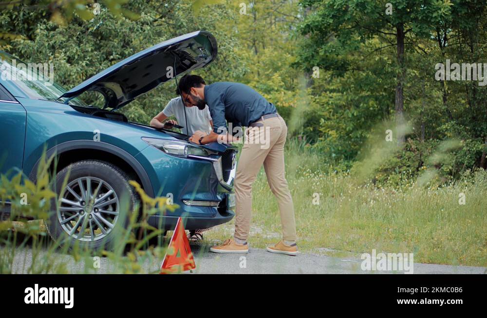 Repairing Accident Car.Sad Disappointed Man On Broken Car Stock Video ...