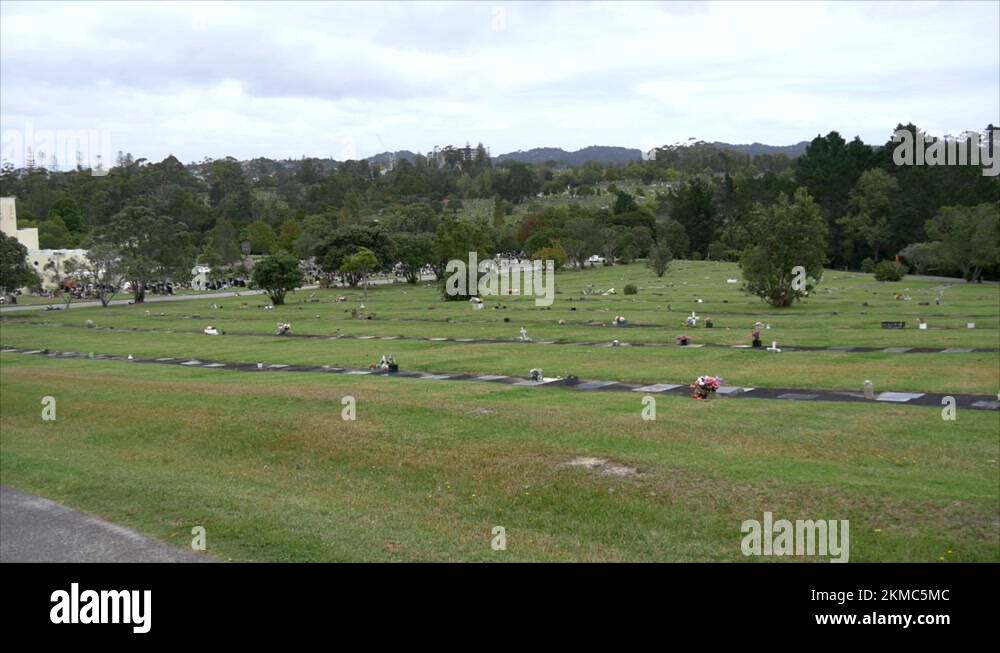 Shot of cemetery and tombstone for funeral burial from Covid 19 ...