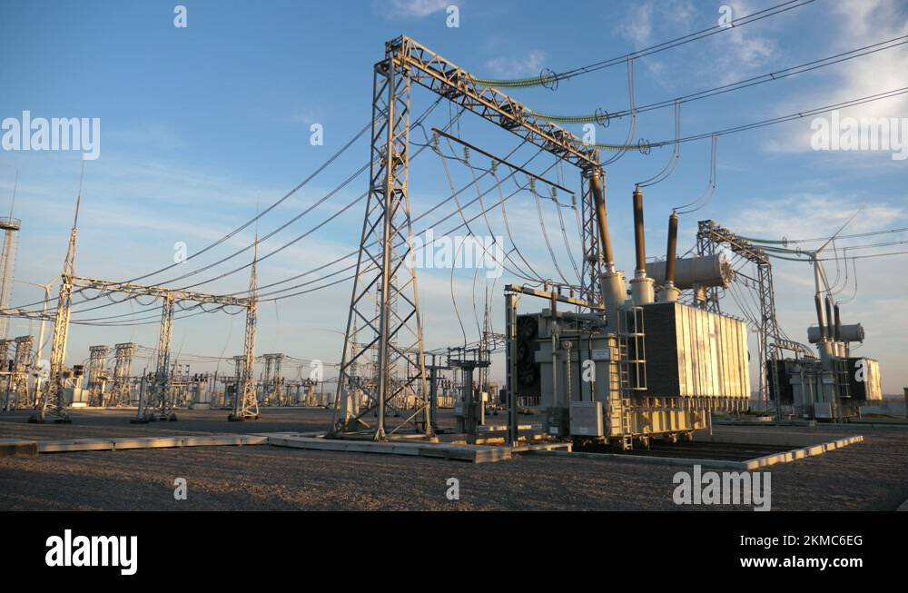 Electric power station with lofty metallic pillars and square ...