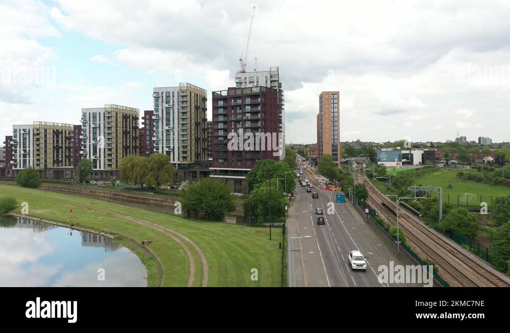 Tall modern building in Ferry lane housing estate from receding drone ...