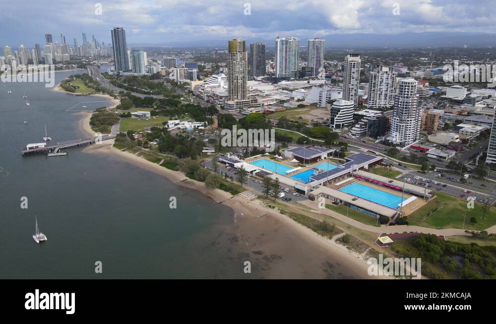 View along beach with high rise buildings in background Stock Videos ...