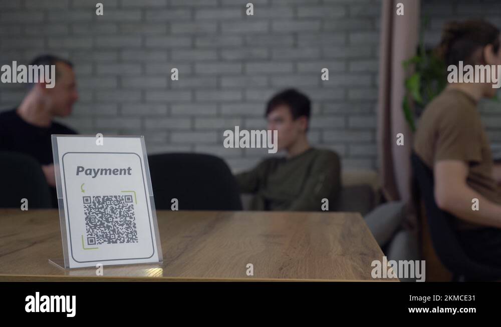 Paying with QR Code. Touch-Free QR Code Commerce. Display with a ...