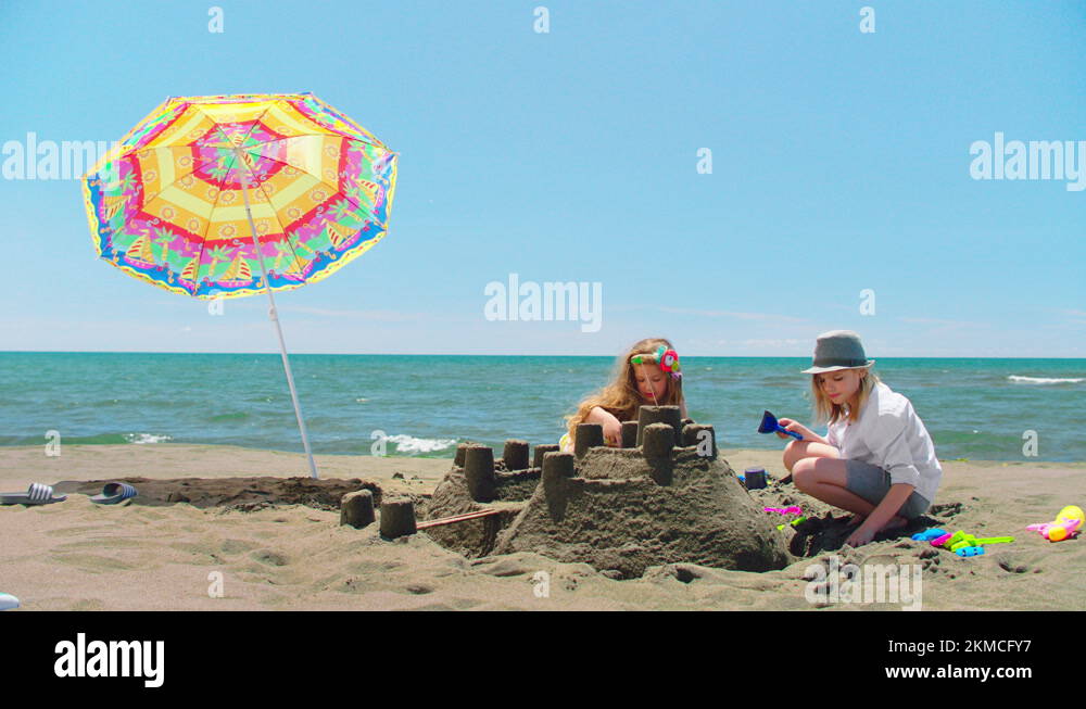 Girl building sandcastle Stock Videos & Footage - HD and 4K Video Clips ...