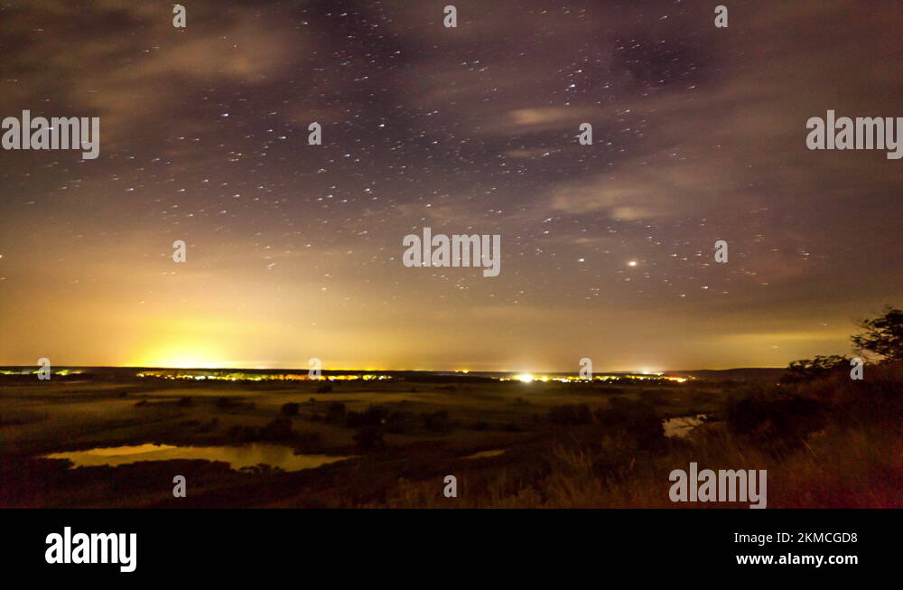 Starry night in mountains Time lapse. Milky way galaxy stars moving ...