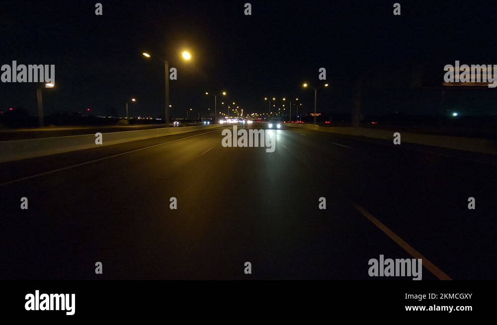 Driving plate of reverse shot roads and highways on a very dark night ...