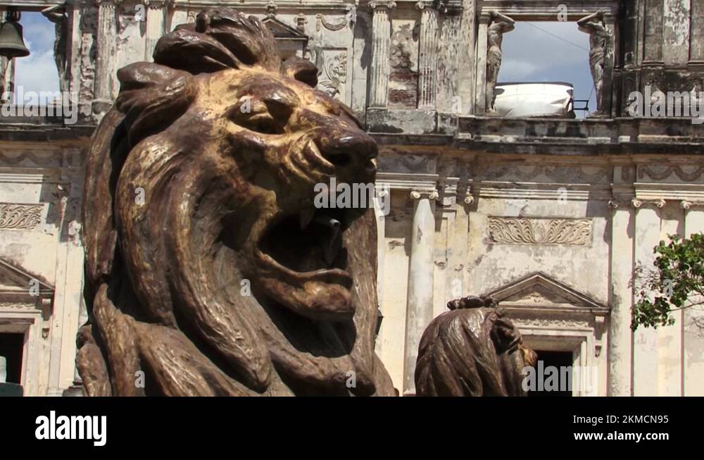 Lion statues at the facade of the Cathedral of the Assumption of Mary ...
