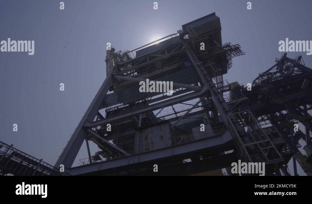 Steel Structure Of A Port Crane With Sun Flare. low angle Stock Video ...