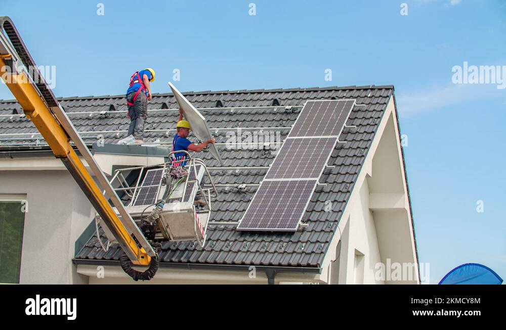 Worker installing large solar panels Stock Videos & Footage - HD and 4K ...