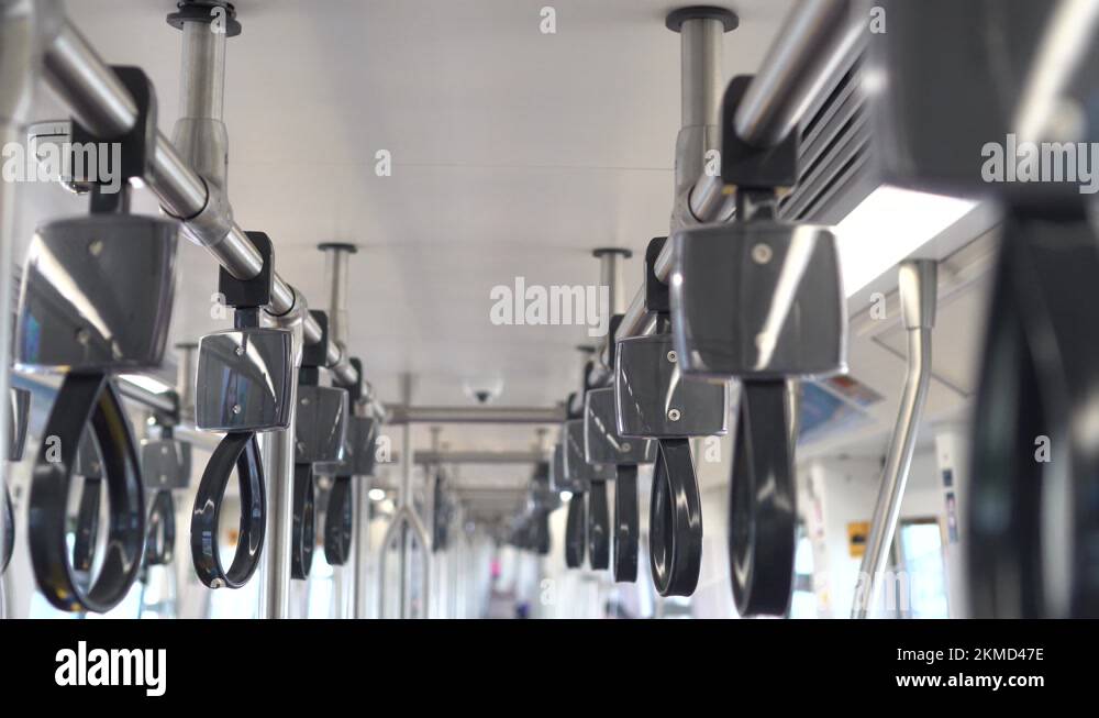 Empty handrails in a metro subway train , Handle hand straps in public ...