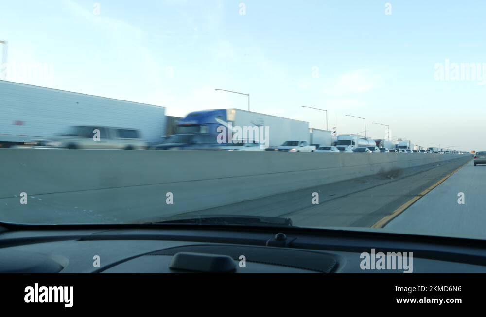 Traffic jam on highway road. Freight lorries, trucks and trailers in ...