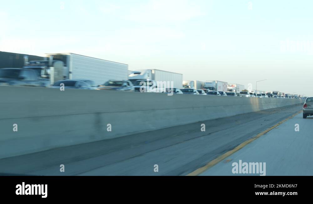 Traffic jam on highway road. Freight lorries, trucks and trailers in ...
