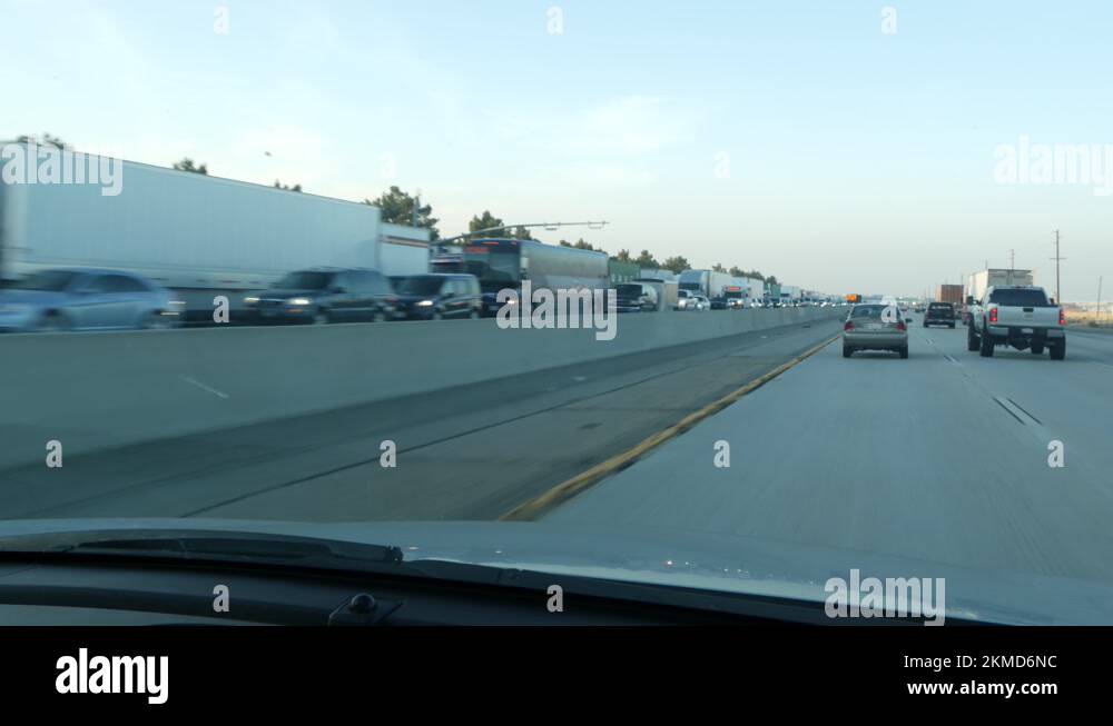 Traffic jam on highway road. Freight lorries, trucks and trailers in ...