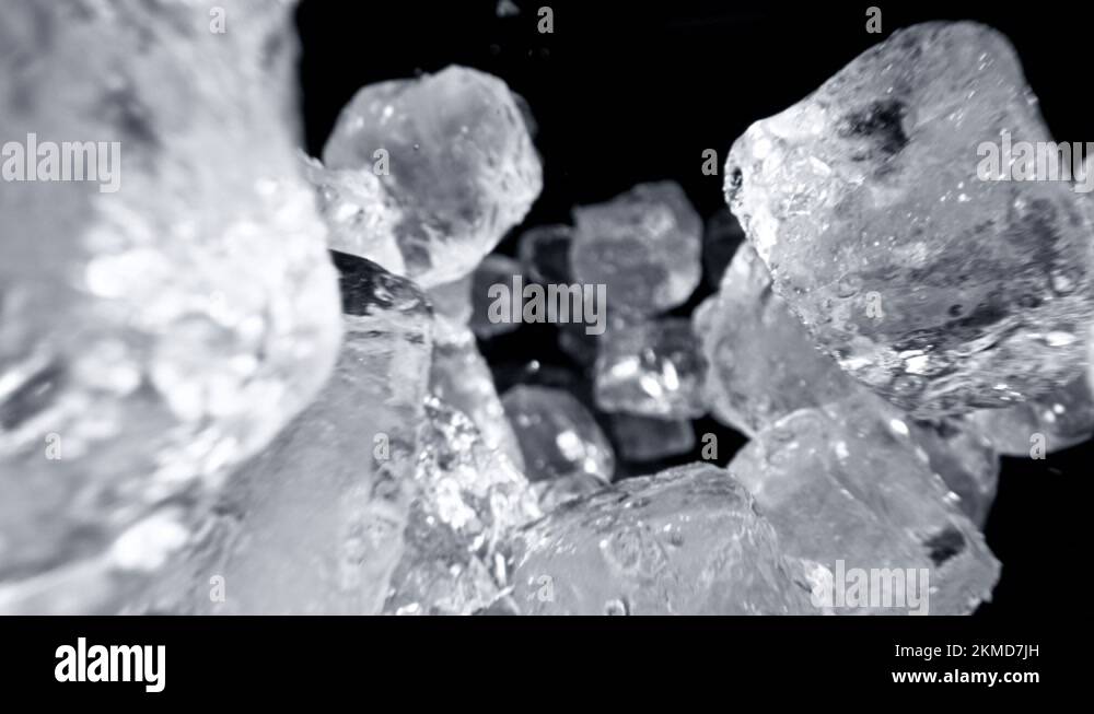 Super Slow Motion Shot of Ice Cubes Flying Towards Camera at 1000fps ...