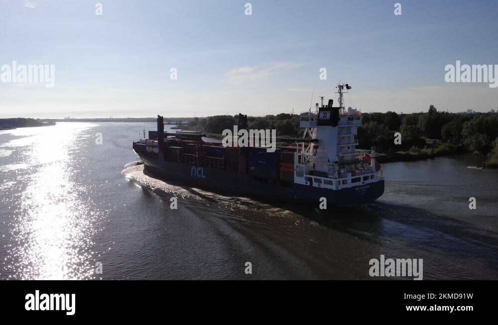 NCL Alesund Cargo Container Ship Travelling By The River With Loaded ...