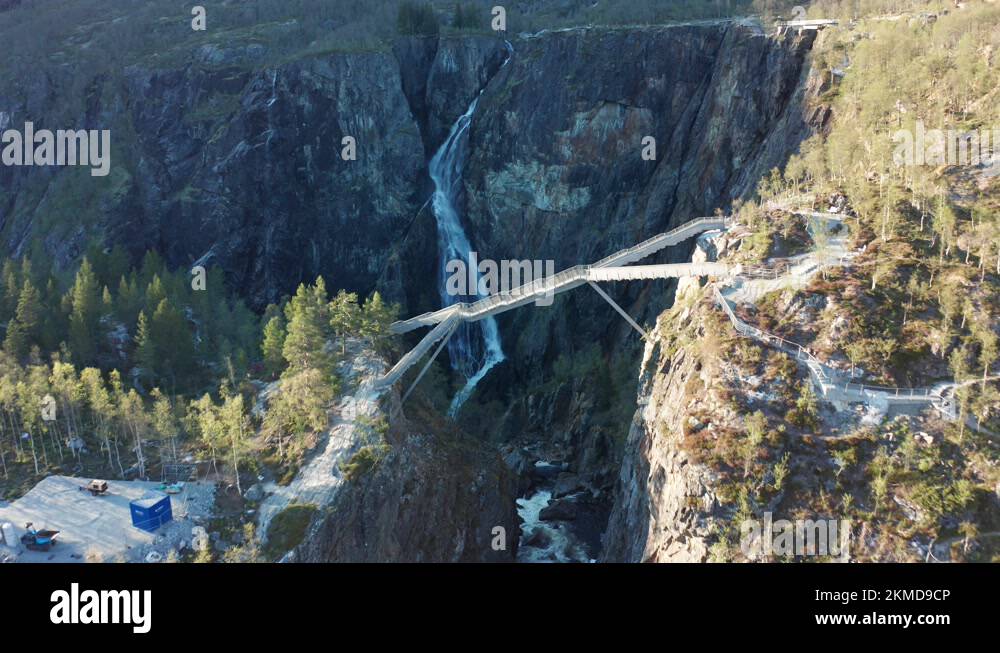 Spectacular walkway crossing deep canyon above Vøringsfossen waterfall ...