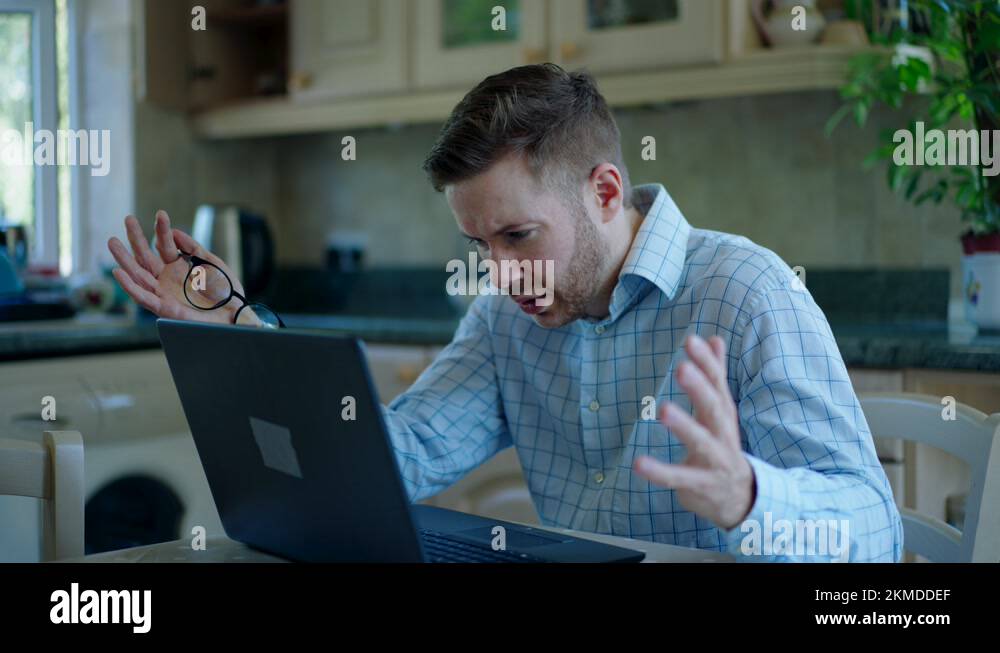 A Frustrated Man Has Problems With His Laptop, Virus Or Slow Internet ...
