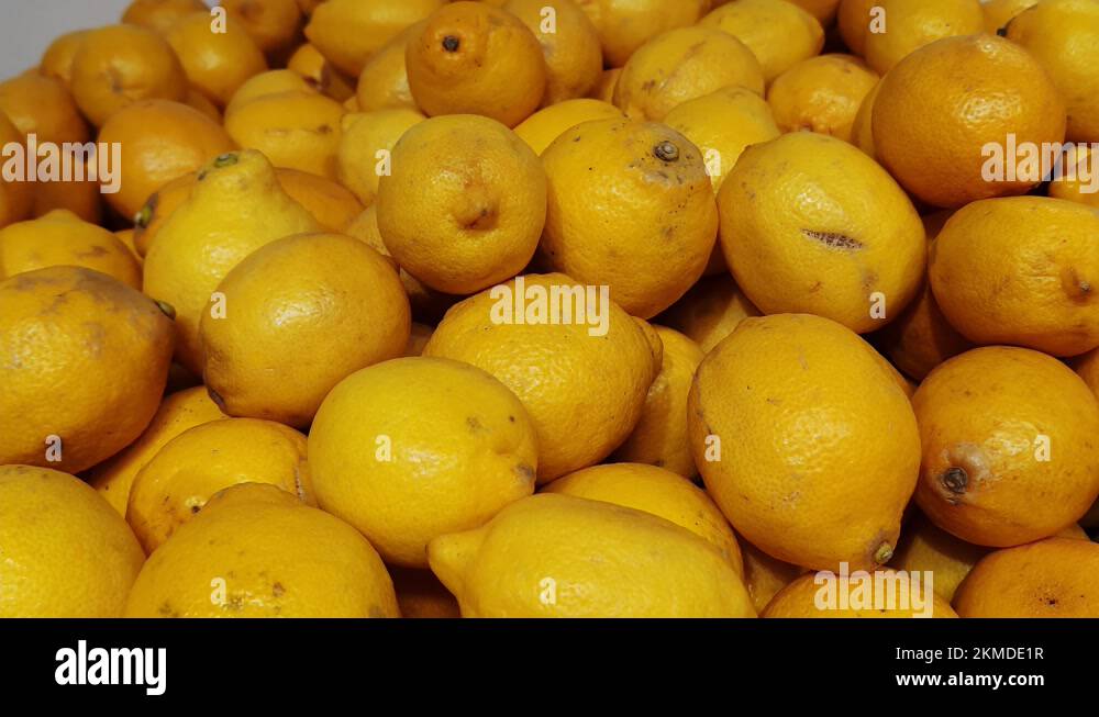 Stack of lemons in grocery store. Industry of selling products Stock ...