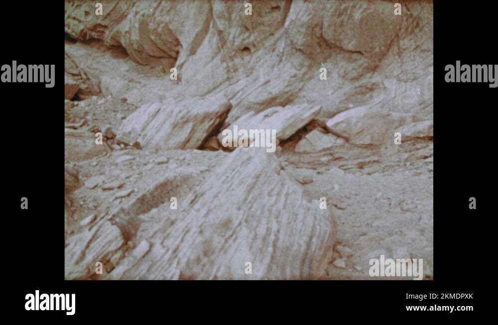 1970s: Model of people drying crops around a pit house. Cave. Storage ...