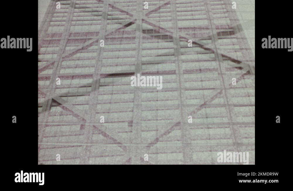 1970s: Children run on a bridge. Tiles with an X shadow. Building with ...