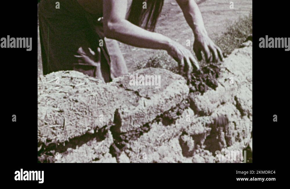 1960s: Native American man builds structure with mud and bricks. Man ...