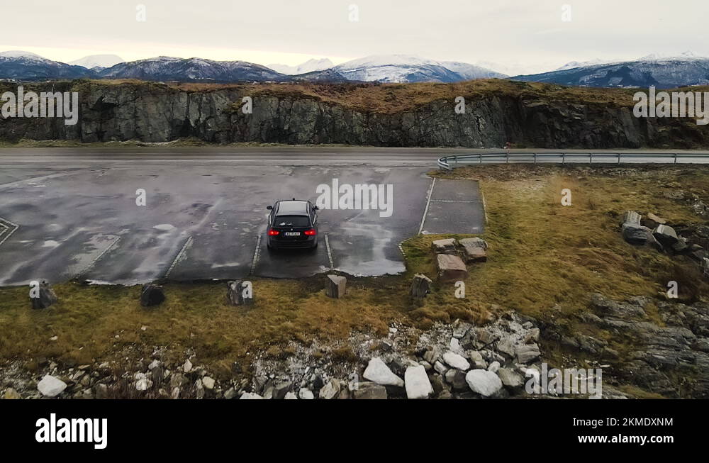 Black BMW Car Parked On Parking Lot Reveal Beautiful Seascape And ...