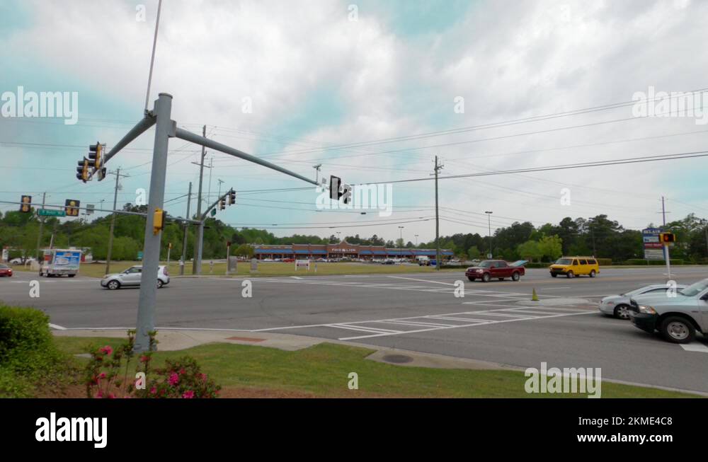 looking down over traffic at a 4 way intersection with Food Lion retail ...