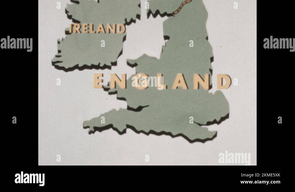 1960s: Street in London, traffic and people walking. Map of England and ...