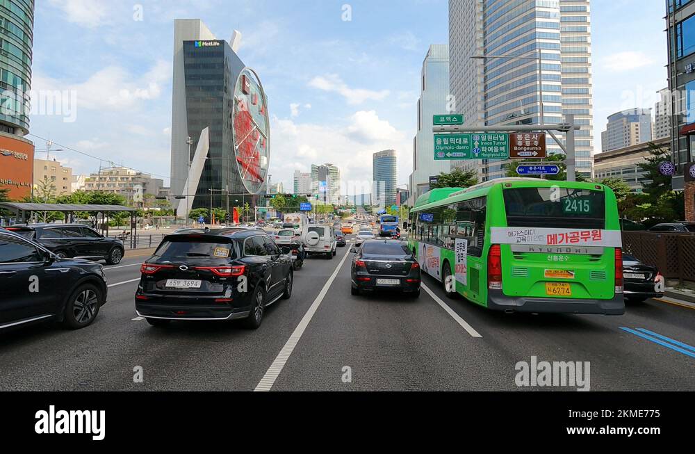 Seoul downtown Trafic in Yeongdong-daero road, driver's pov passing ...