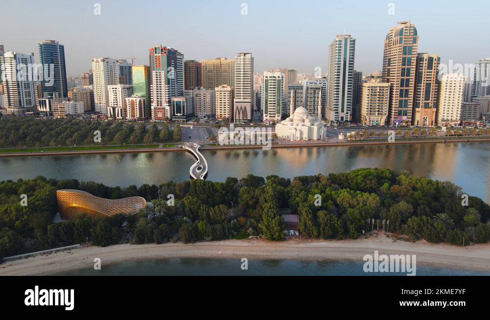 Sharjah aerial view above Al Noor island and mosque and downtown rising above Stock Video ...