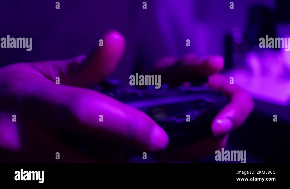 Angry Gamer plays video game at night Stock Video Footage - Alamy