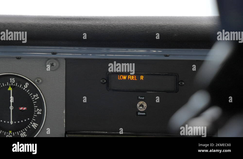 Low Fuel Right Lit On The Dashboard Panel Of A Private Aircraft. Fuel ...